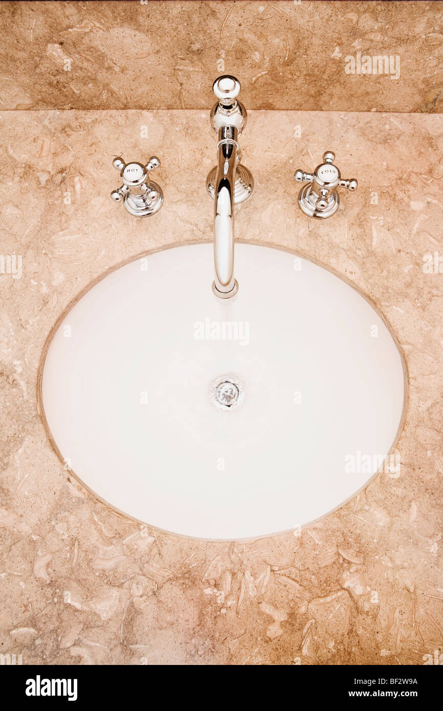 Close-up of a bathroom sink Stock Photo - Alamy
