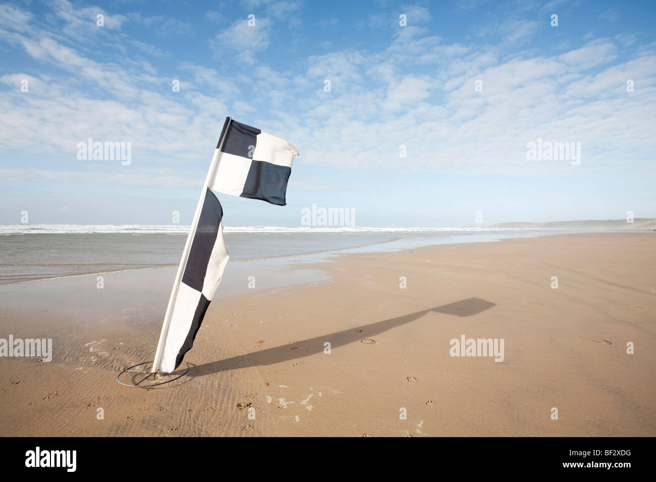 Flags in sand on beach hi-res stock photography and images - Alamy