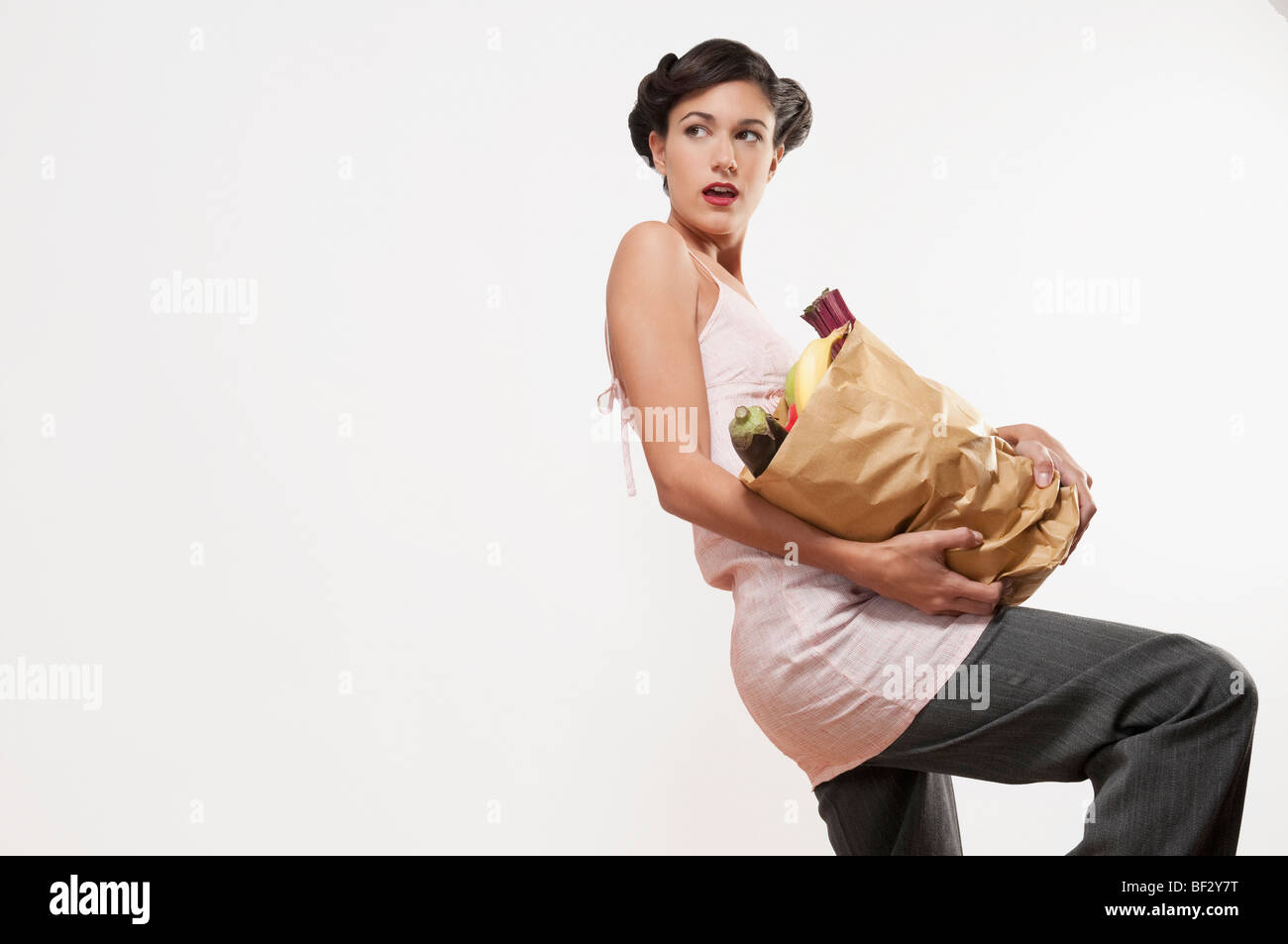 Heavy bag woman hi-res stock photography and images - Alamy