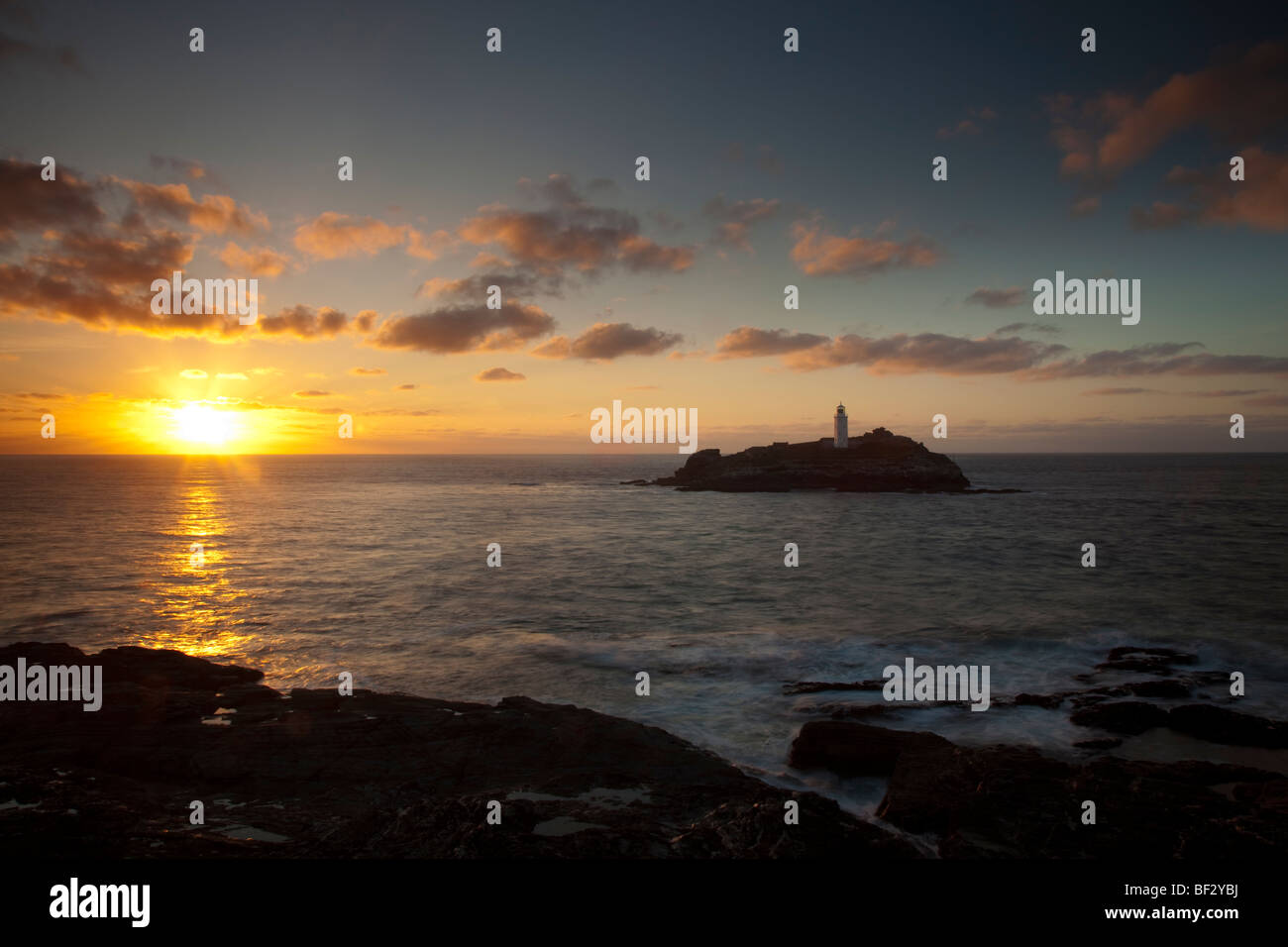 High Tide at Sunset, Godrevy Point and Lighthouse, St Ives Bay, North ...