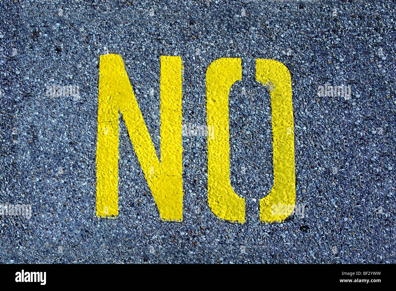 The word "no" painted on blacktop Stock Photo - Alamy
