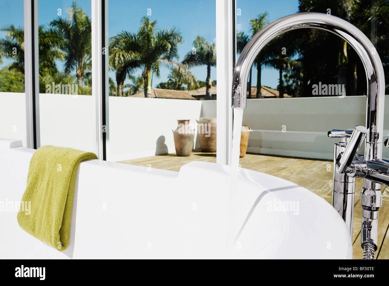 Bathtub in the bathroom Stock Photo - Alamy