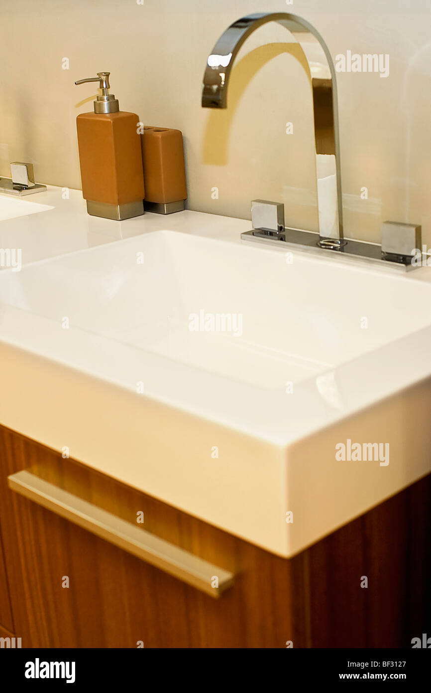 Faucet on a wash bowl in the bathroom Stock Photo - Alamy