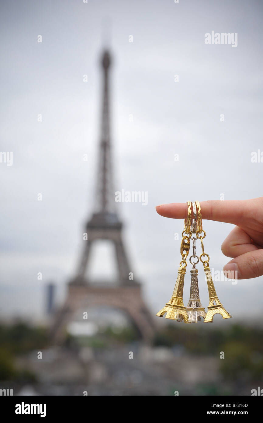 Paris' famous Landmark, the Eiffel Tower, with three key rings dangling ...