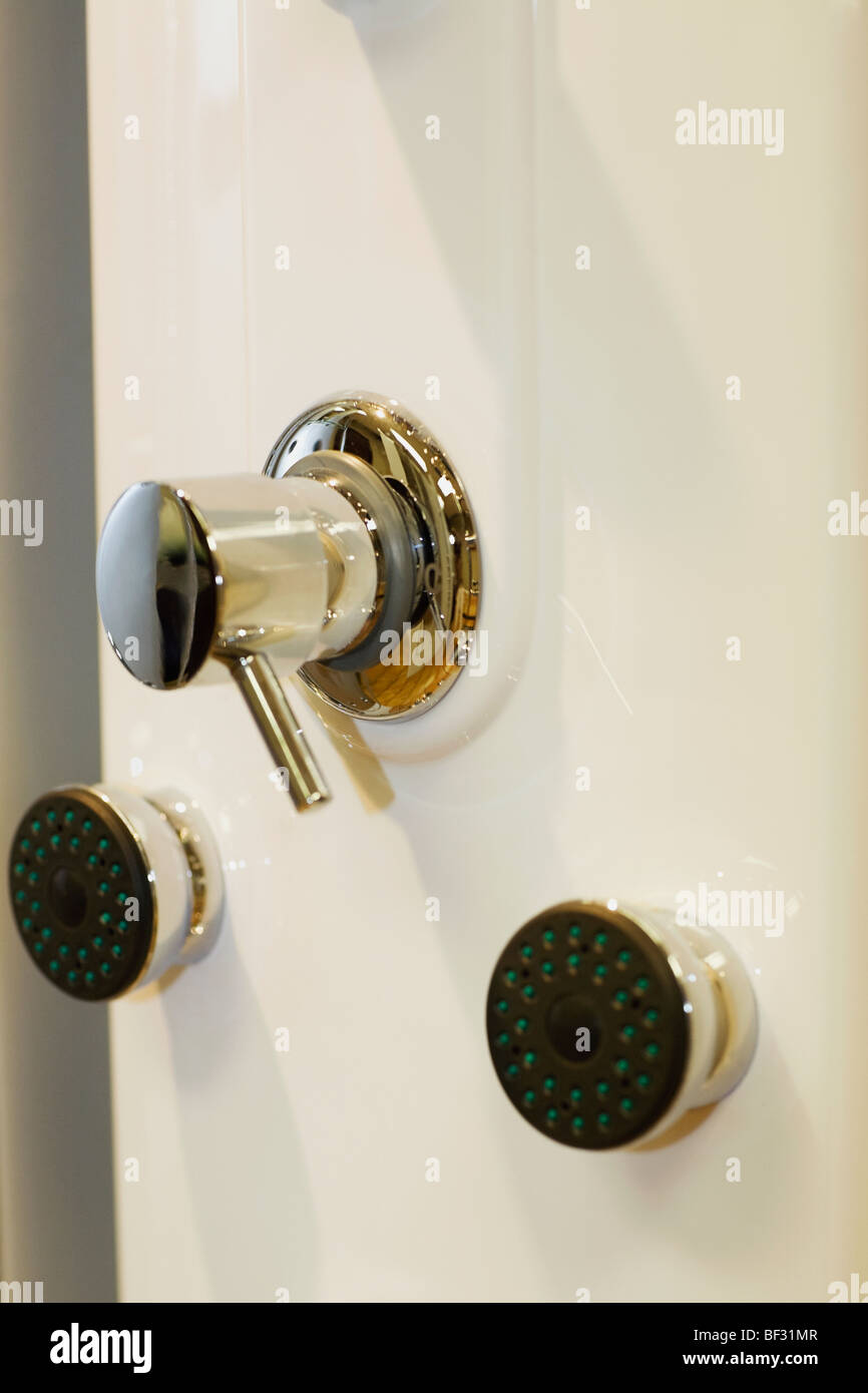 Close-up of faucets in the bathroom Stock Photo - Alamy