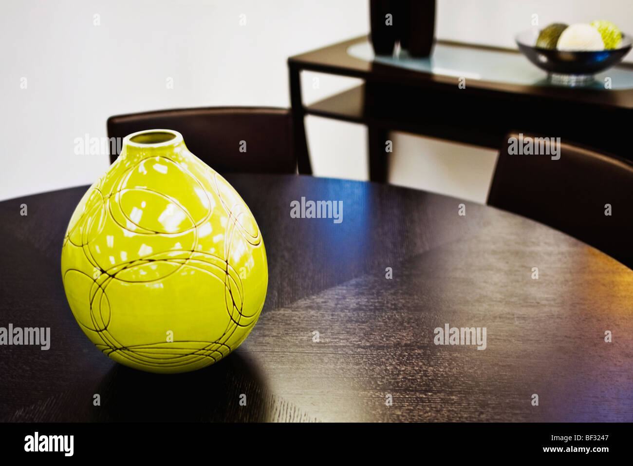 Vase on a dining table Stock Photo - Alamy