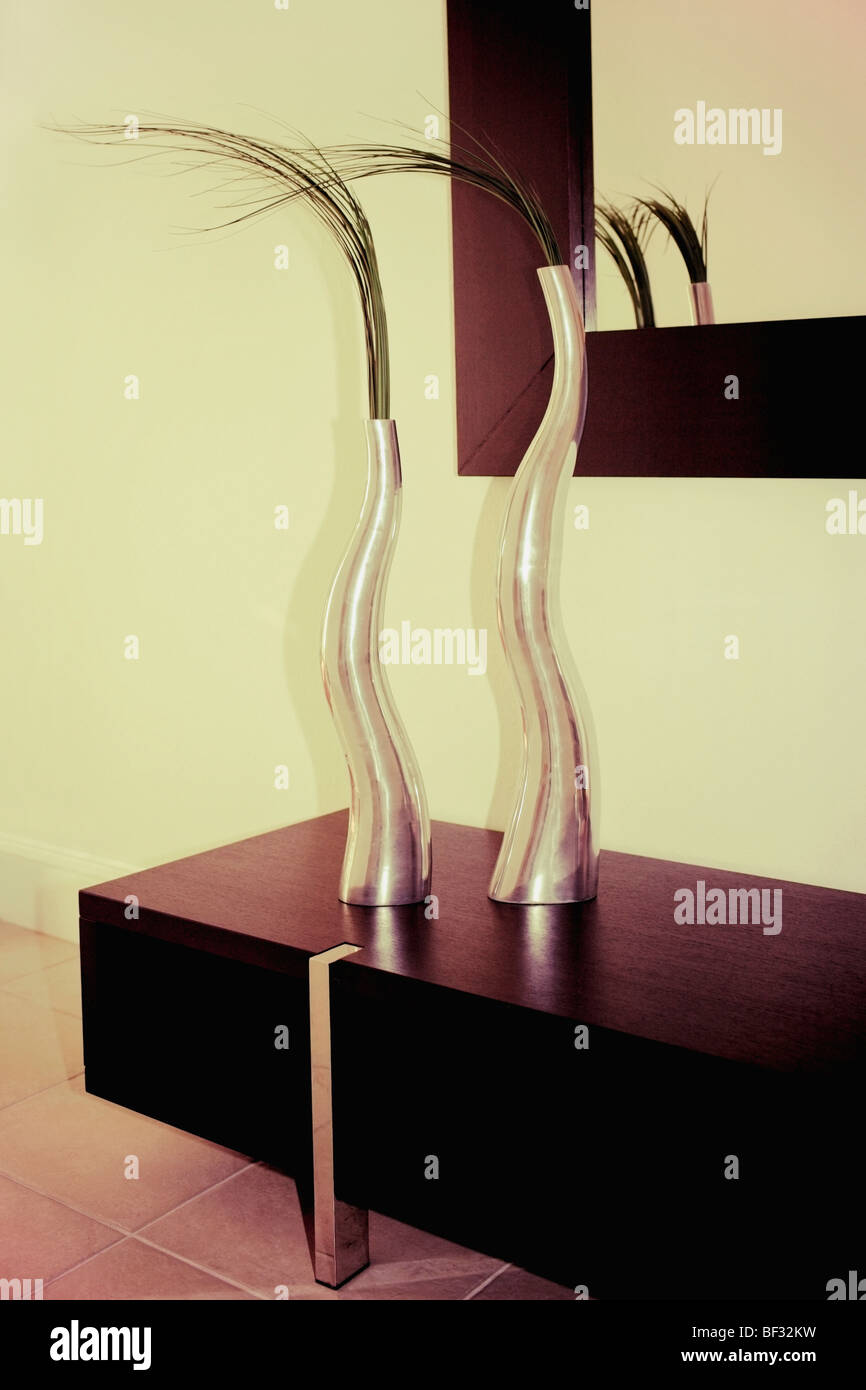 Two vases on a chest Stock Photo - Alamy