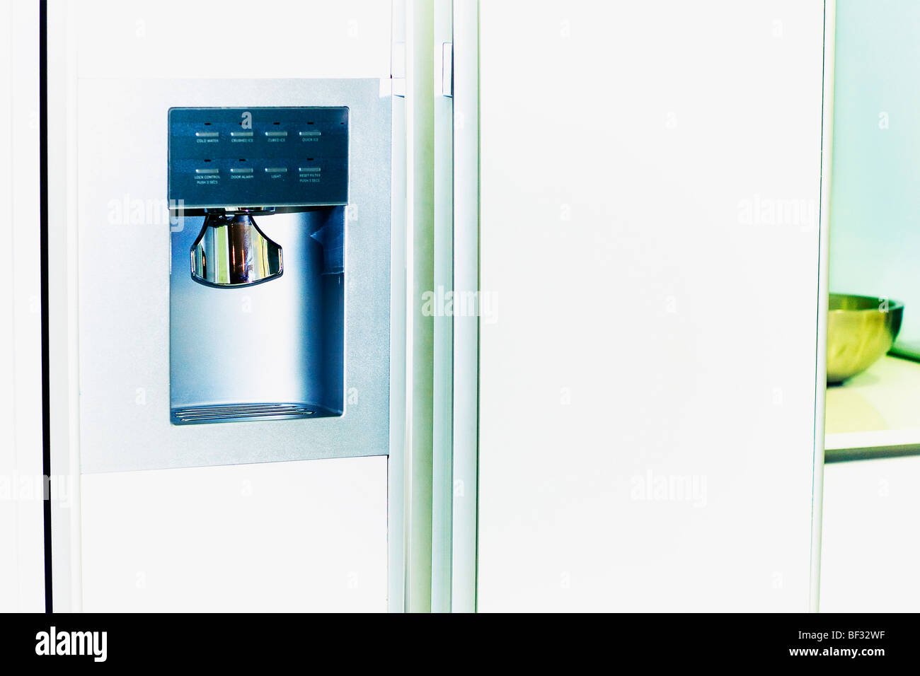 Water dispenser of a refrigerator Stock Photo - Alamy