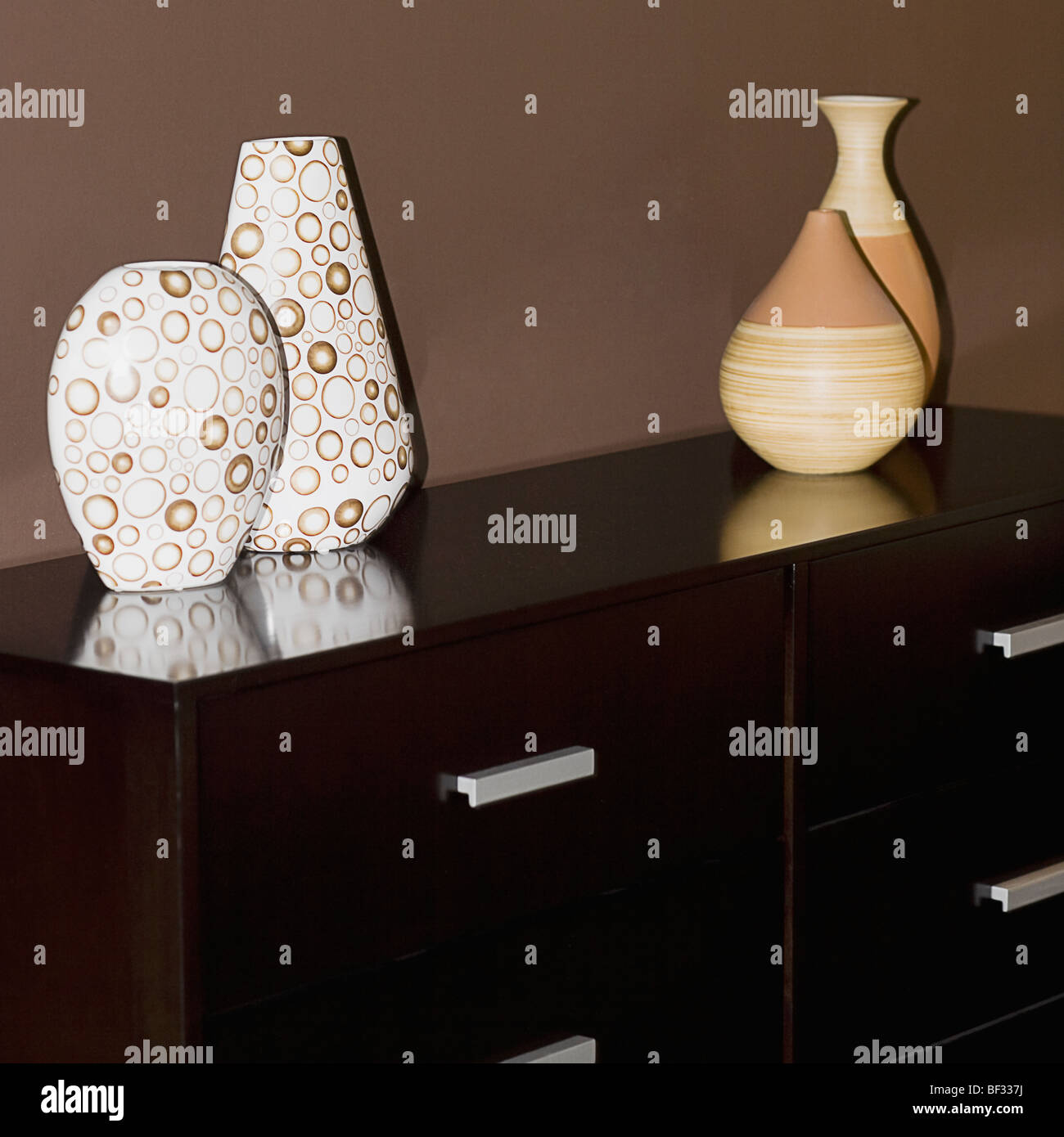 Vases on a chest Stock Photo - Alamy