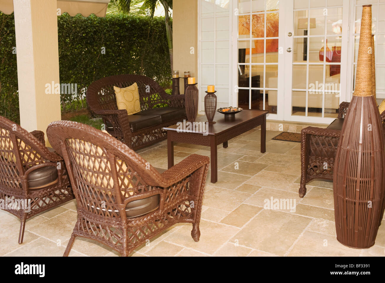 Furniture under a patio Stock Photo - Alamy
