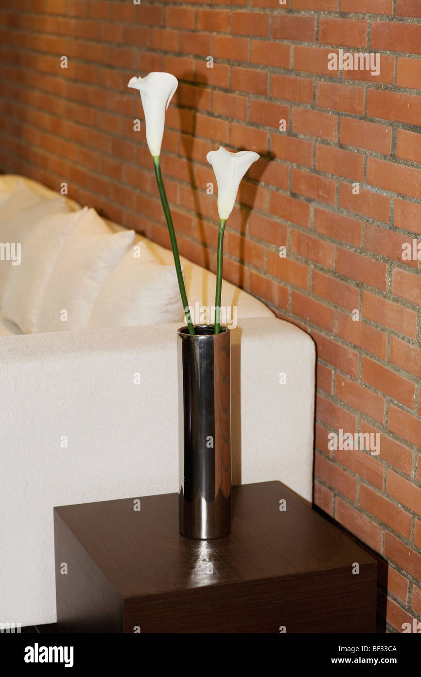 Vase on a side table Stock Photo - Alamy