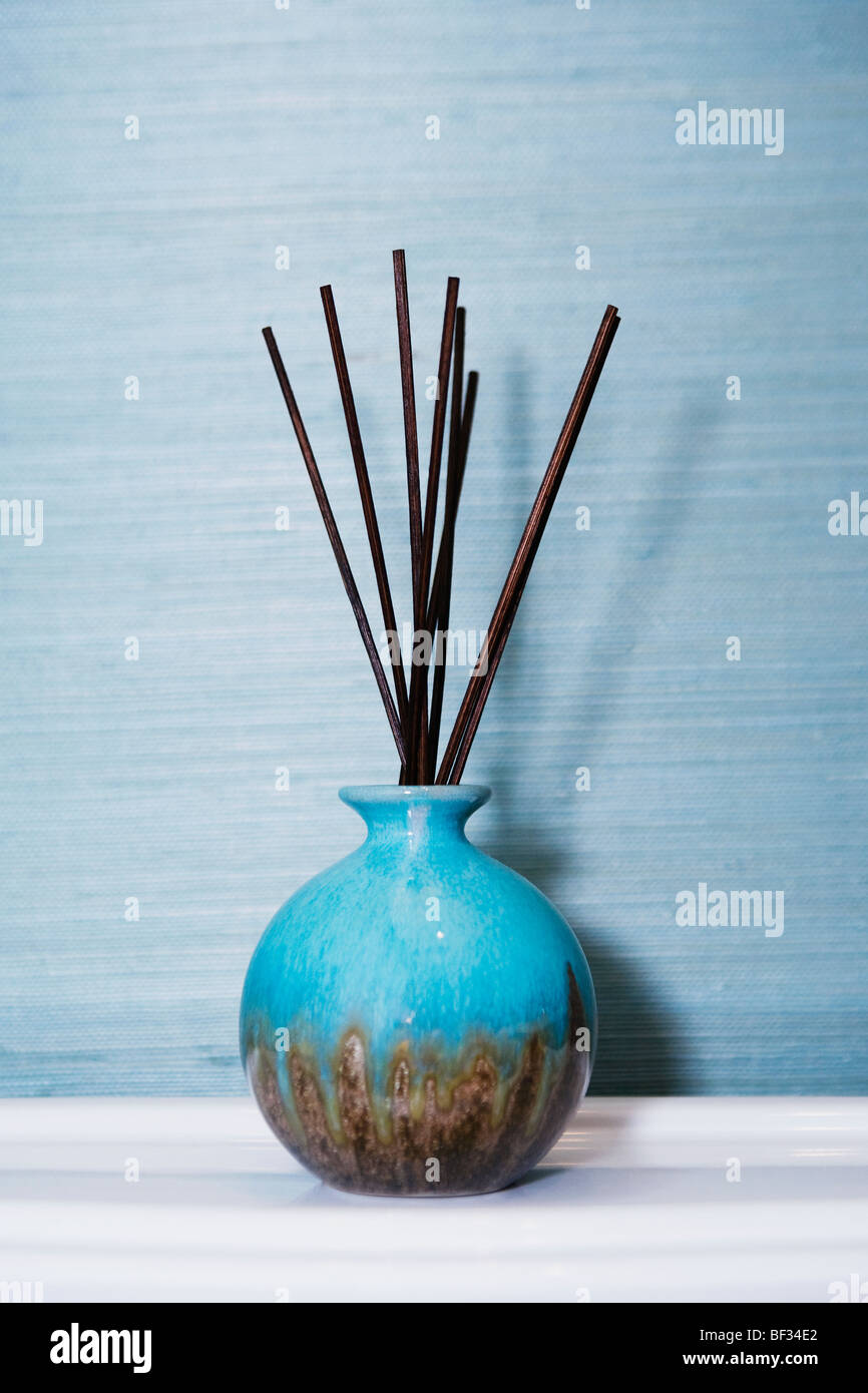 Fragrance sticks in a pot Stock Photo - Alamy