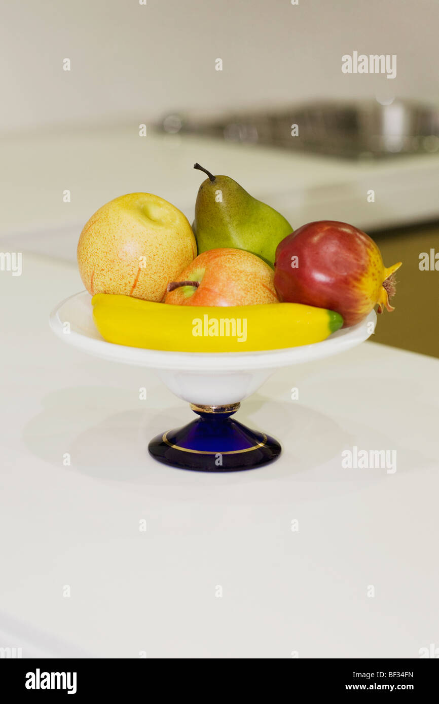 Fruits in a bowl Stock Photo - Alamy