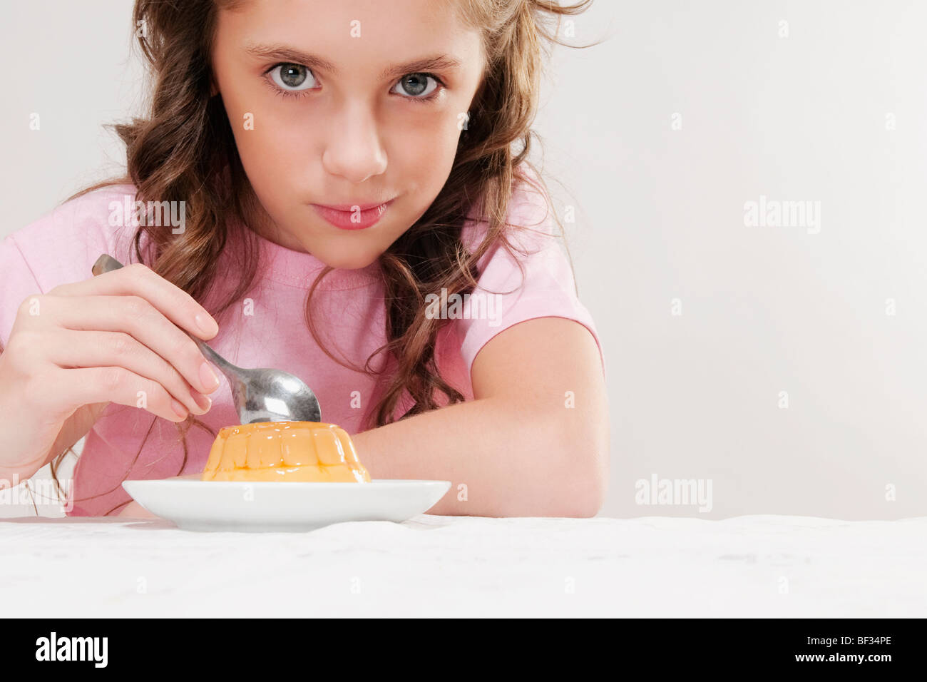 Girl eating jelly Stock Photo - Alamy