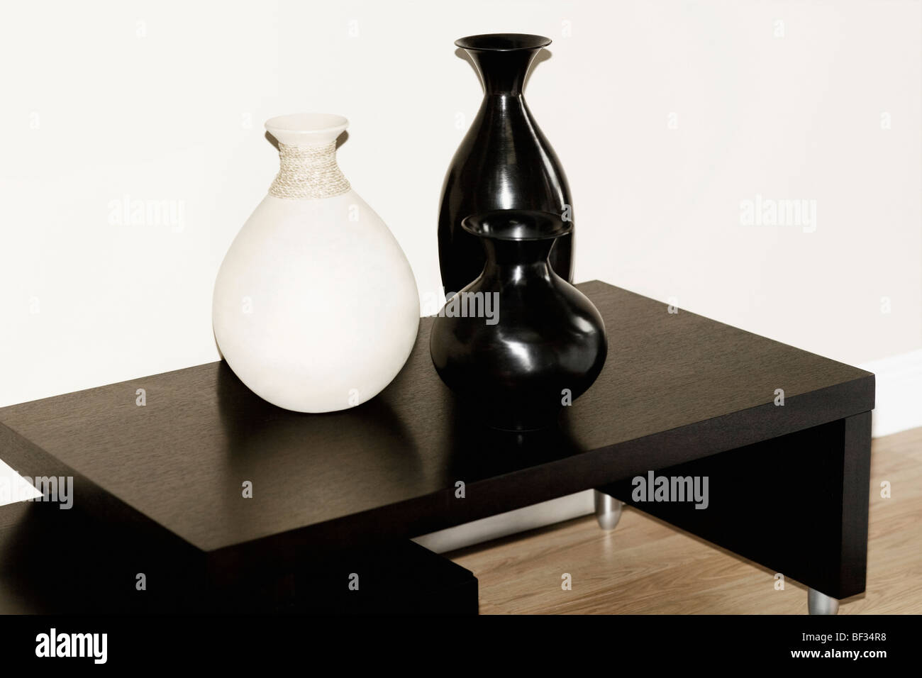 Three vases on a sideboard Stock Photo - Alamy