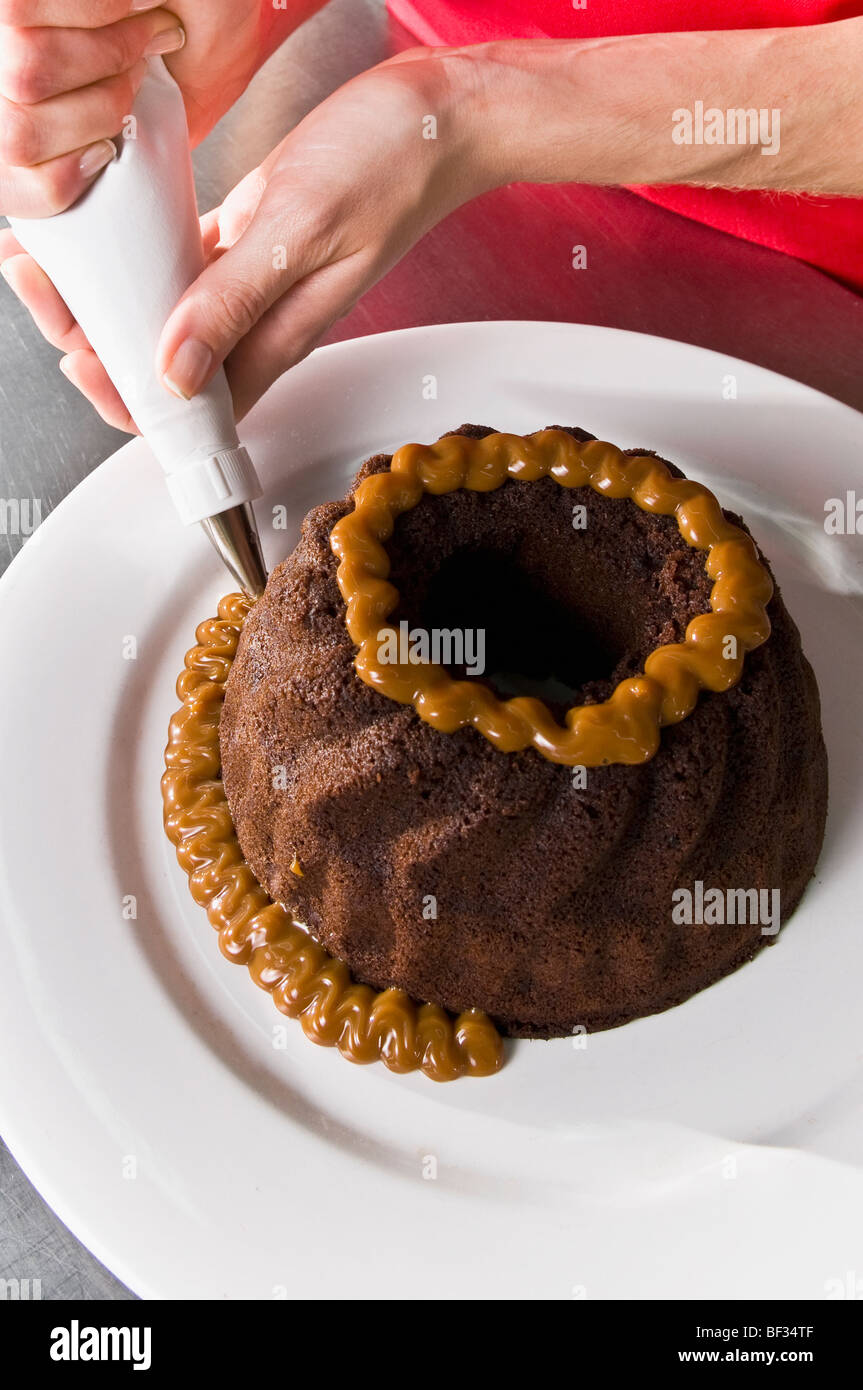 Professional chef baking a cake hi-res stock photography and images - Alamy