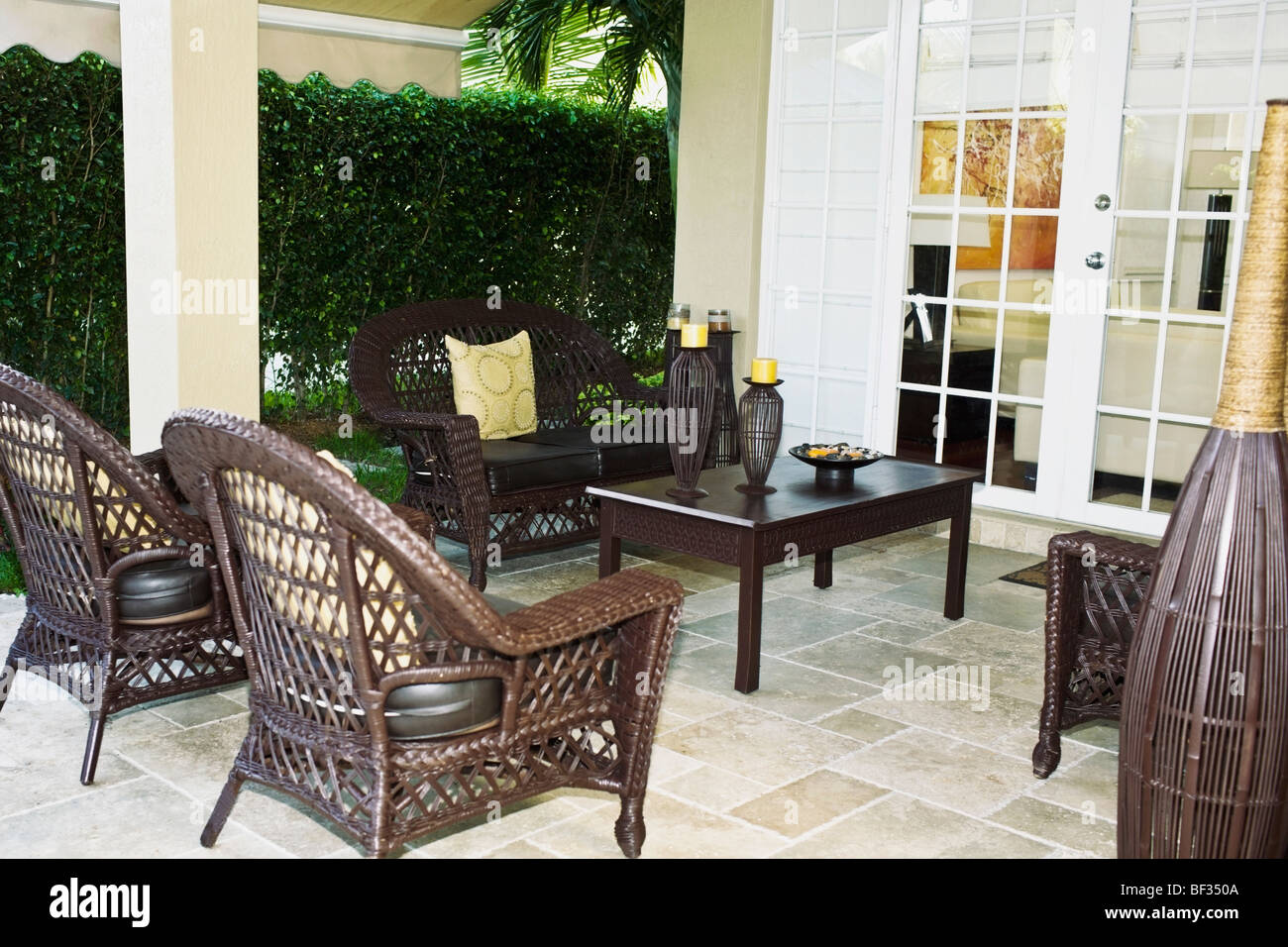 Furniture under a patio Stock Photo - Alamy