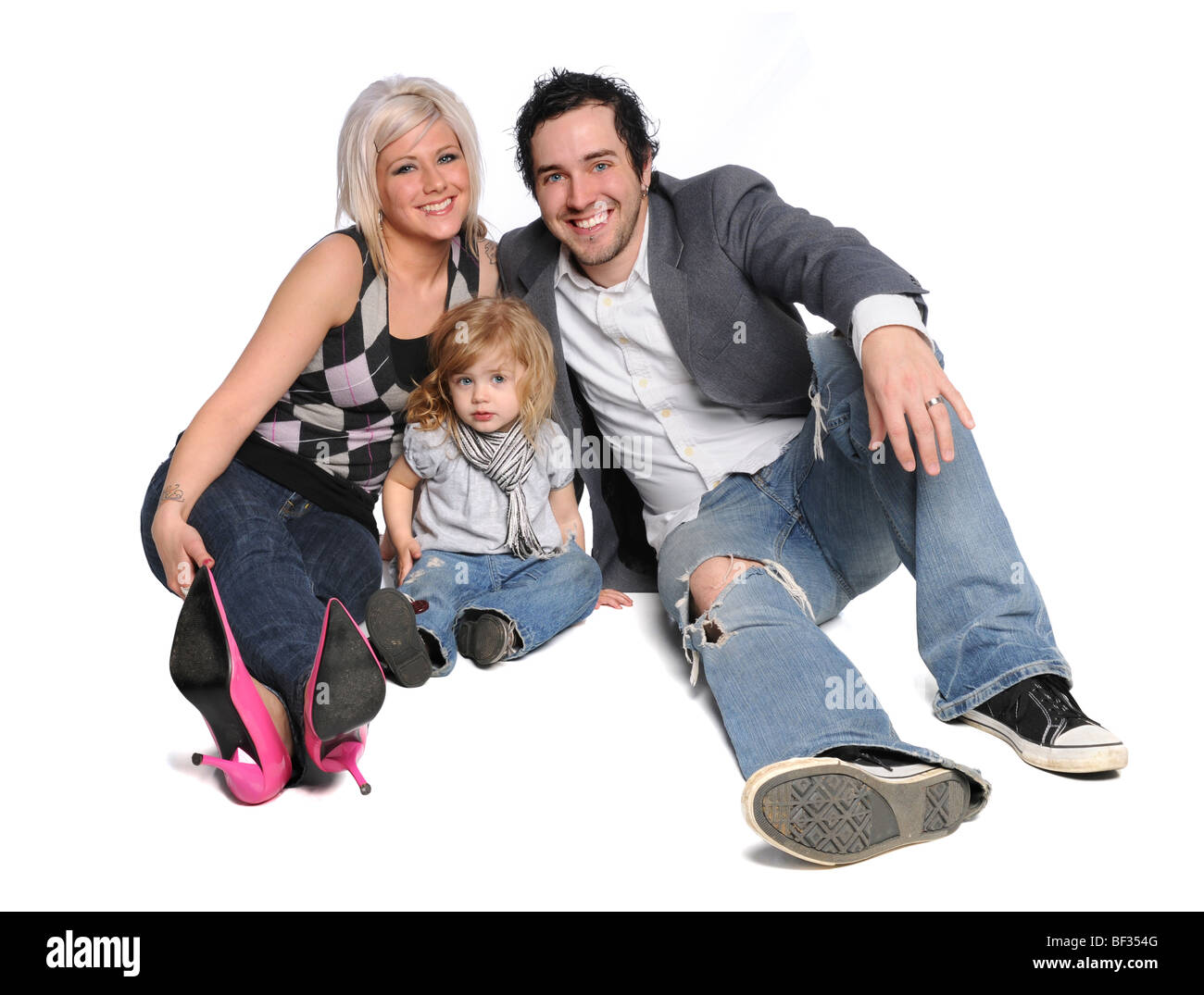 Portrait of young family over white background Stock Photo - Alamy