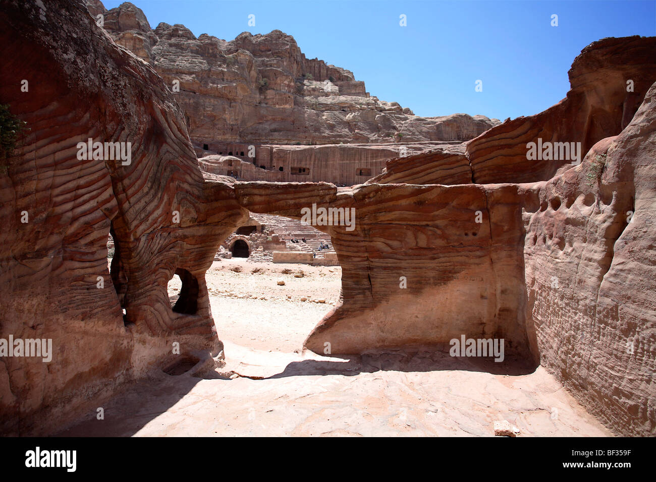 Jordan, Petra, view of the theater and tombs above it through a natural ...