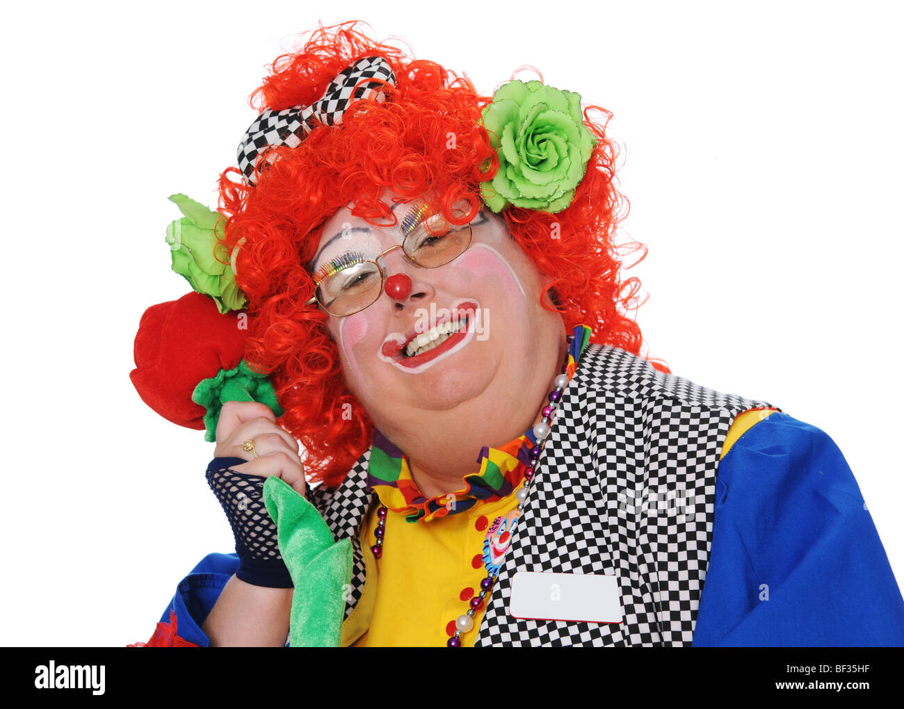 Clown posing with rose isolated over a white background Stock Photo - Alamy