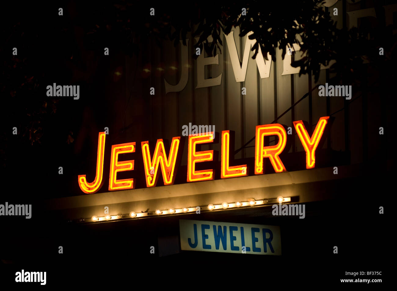 Neon jewelry sign over a the storefront of a jeweler Stock Photo - Alamy