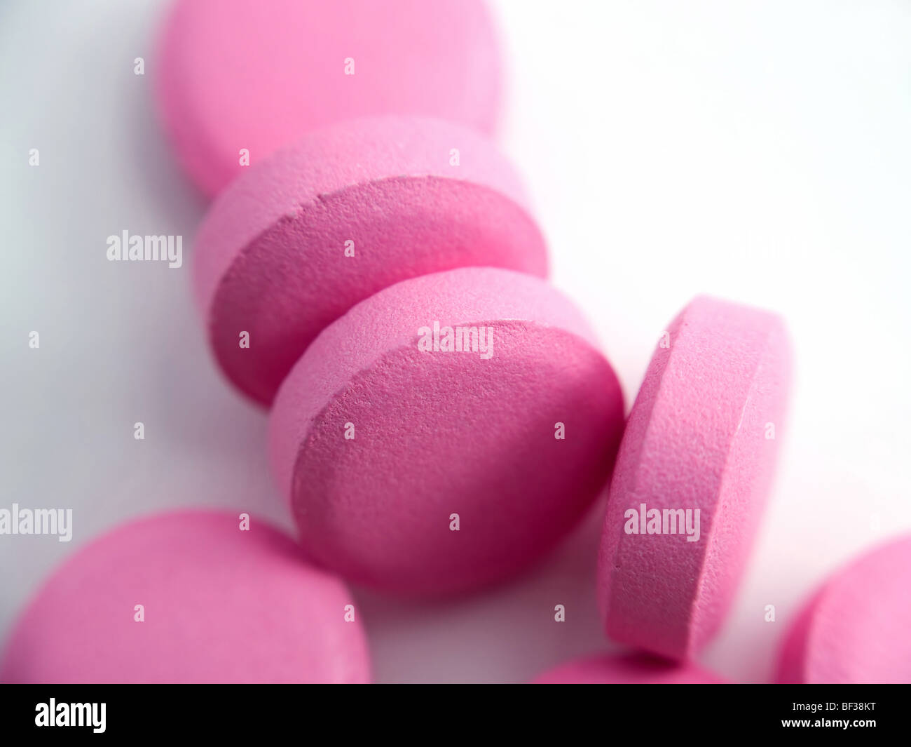 Medium group of pills on white background Stock Photo - Alamy
