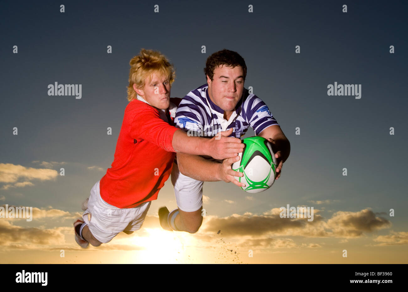 Full length tackle action hi-res stock photography and images - Alamy