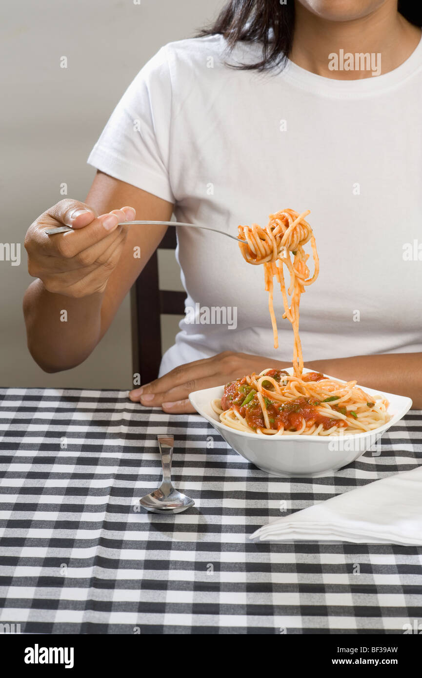 Woman eating pasta black and white hi-res stock photography and images ...