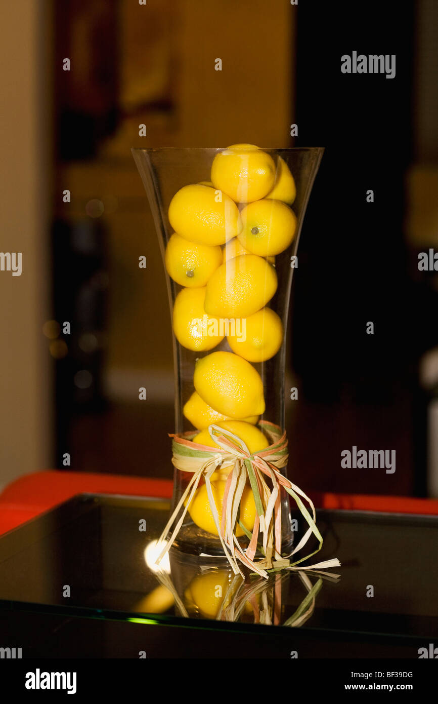 Lemons in a glass Stock Photo - Alamy