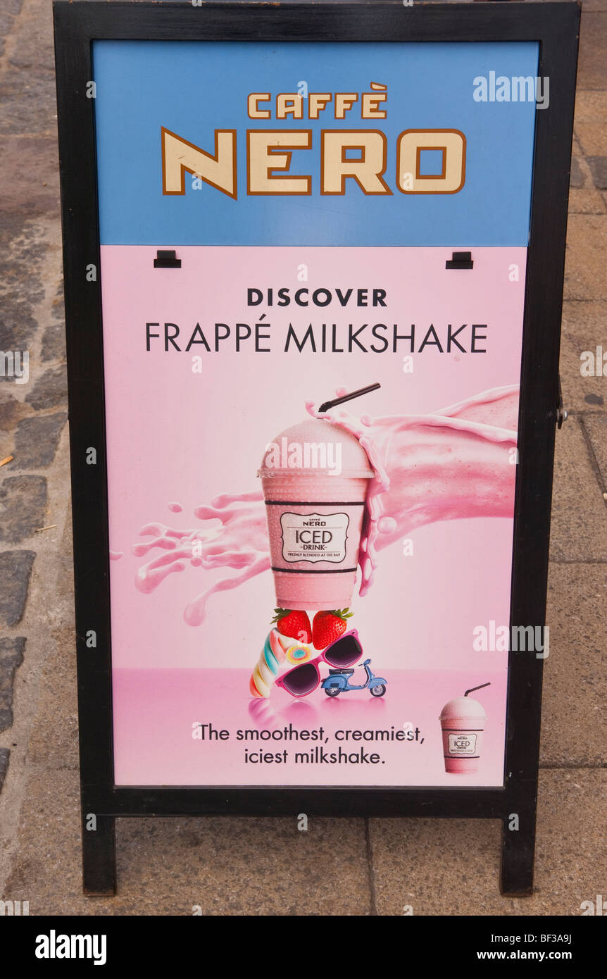 A sign outside a caffe nero cafe advertising Frappe milkshake in ...
