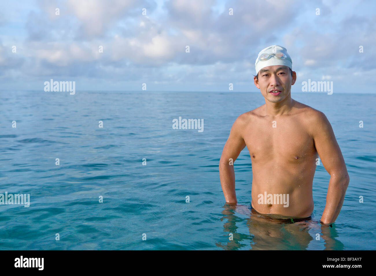 Man in tropical sea Stock Photo - Alamy