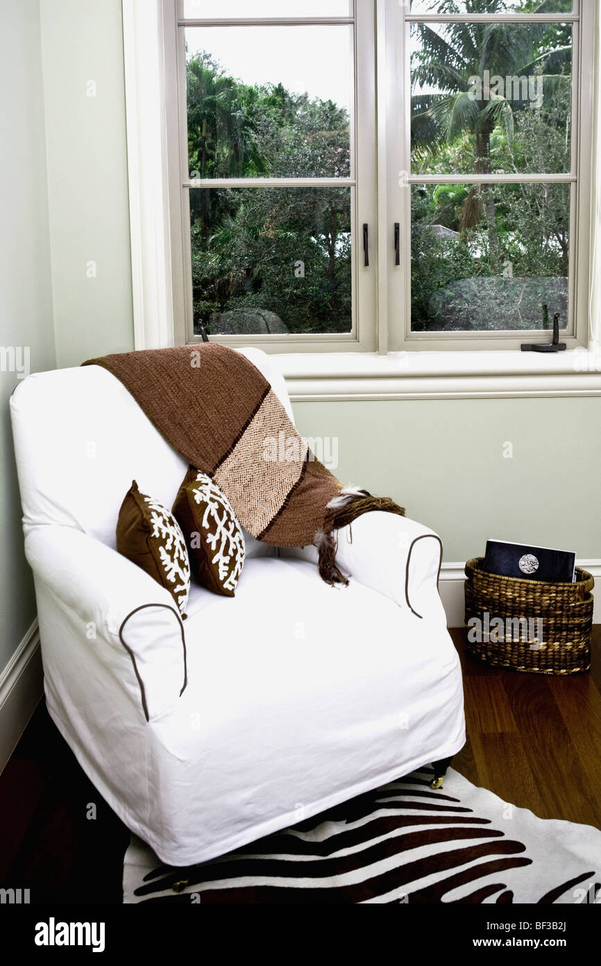 Armchair in a living room Stock Photo - Alamy