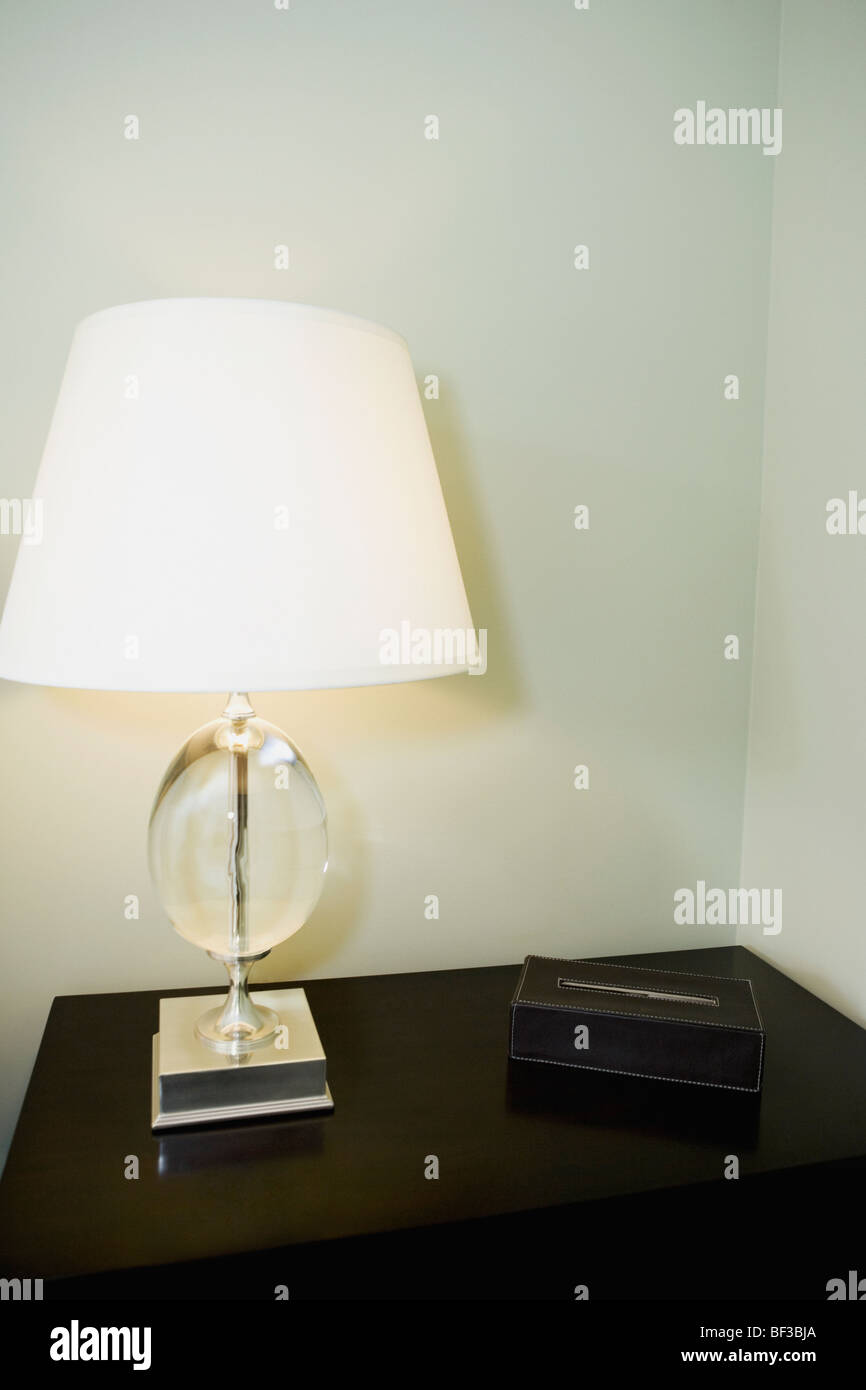 Lamp on a chest Stock Photo - Alamy