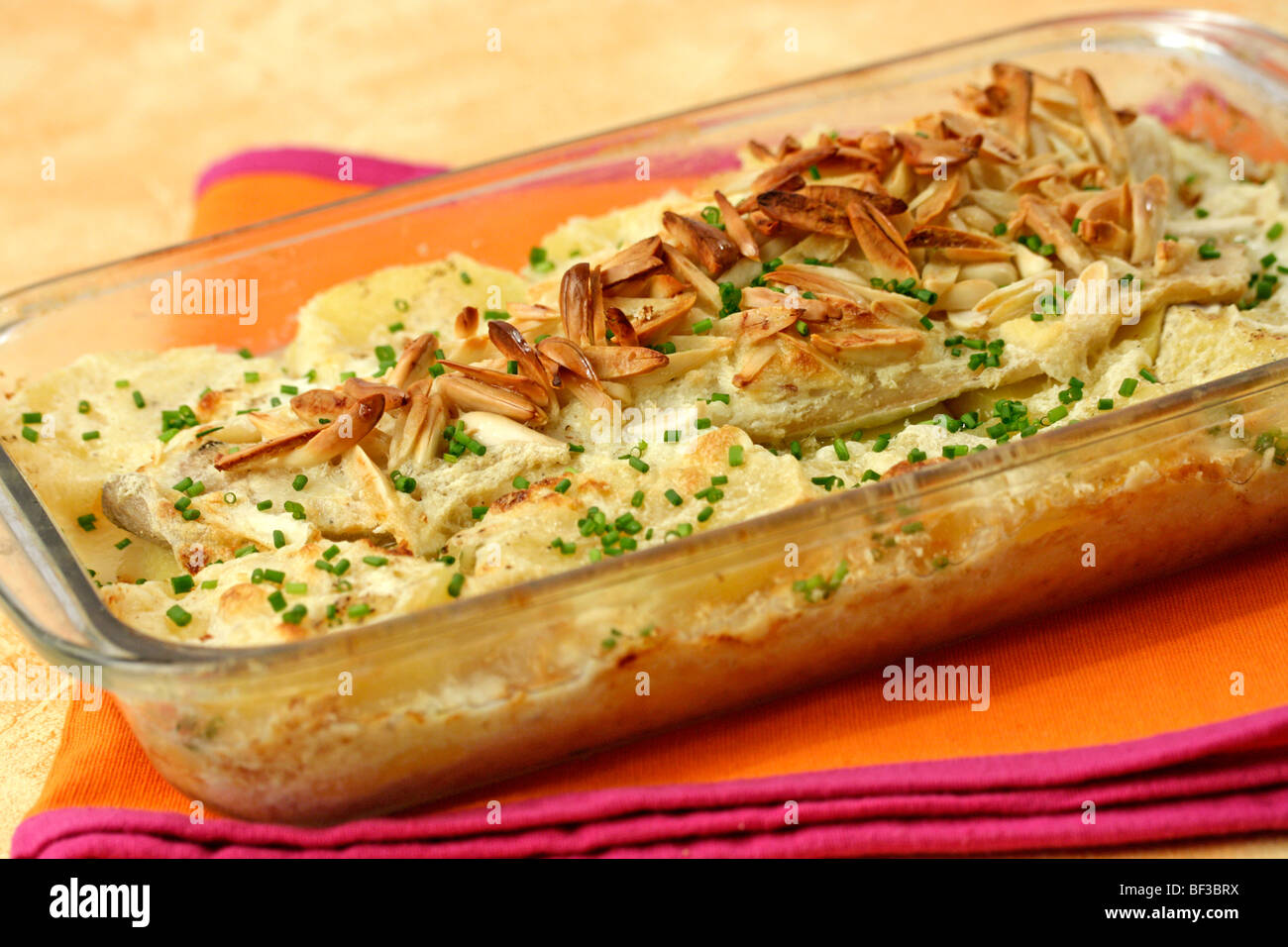 Baked cod with nuts hi-res stock photography and images - Alamy