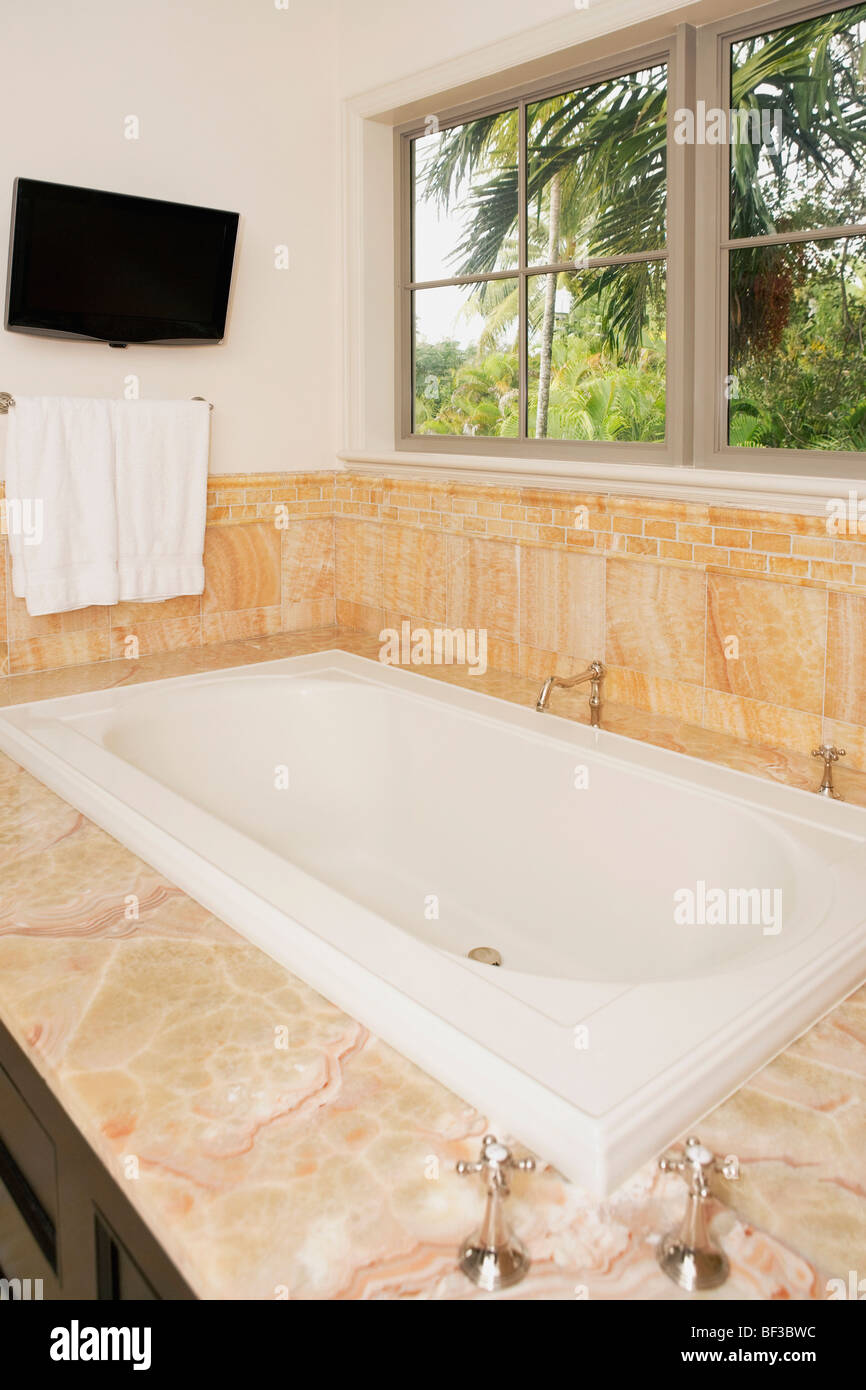 Bathtub in a bathroom Stock Photo - Alamy