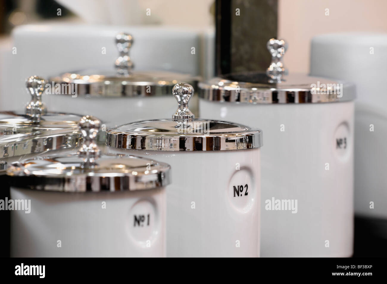 Three containers in a row Stock Photo - Alamy