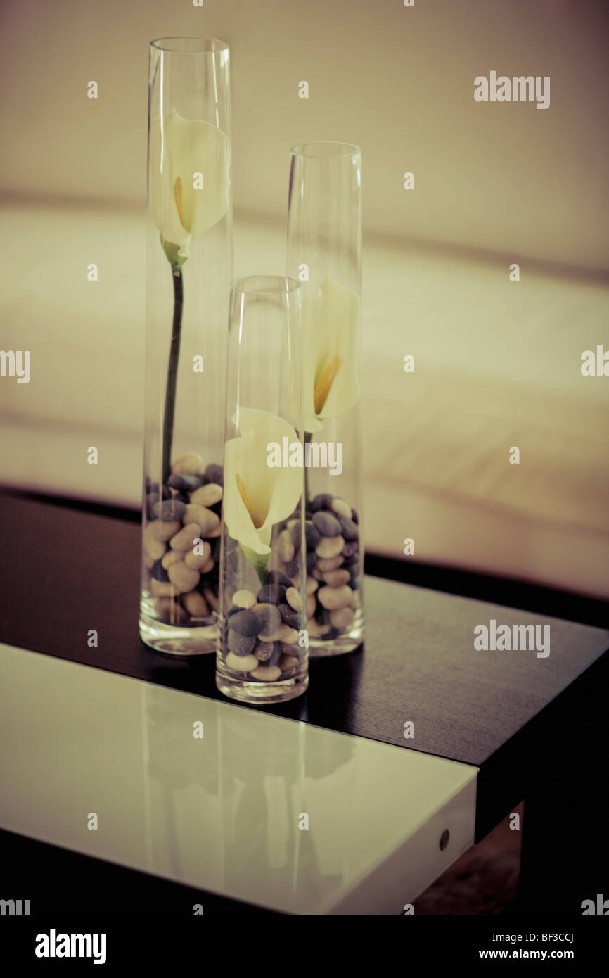 Three vases on a table Stock Photo - Alamy