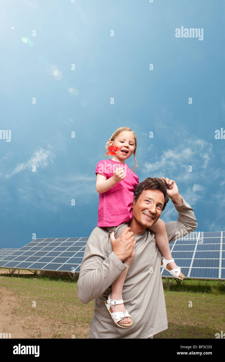 Family posing together front solar hi-res stock photography and images ...