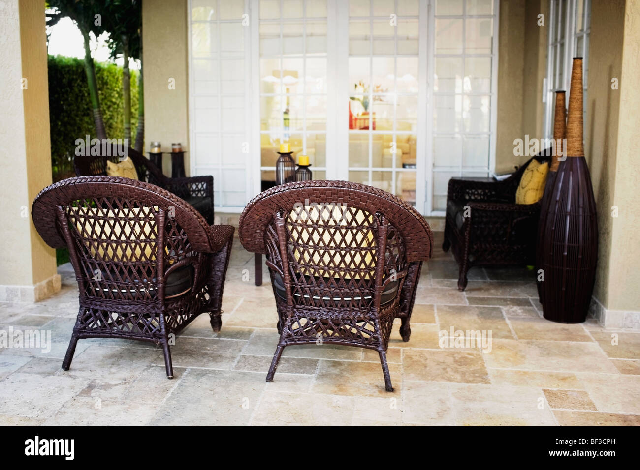 Furniture under a patio Stock Photo - Alamy