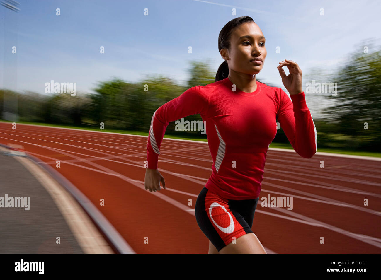 Running on track Stock Photo - Alamy