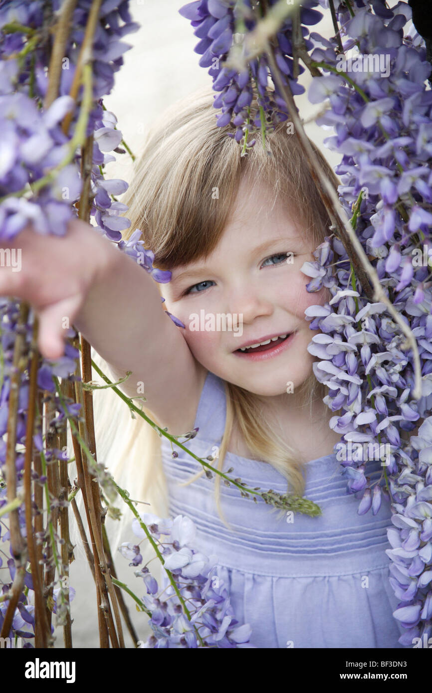 Child with flowers Stock Photo - Alamy