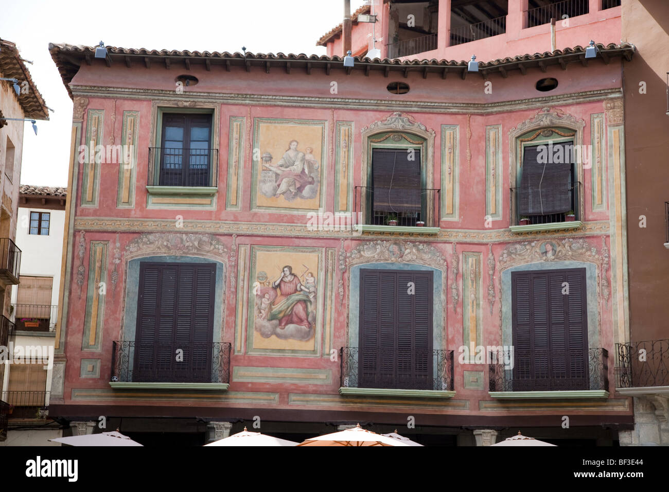 Spain, Graus - Buildings with Neo-classical murals Stock Photo - Alamy