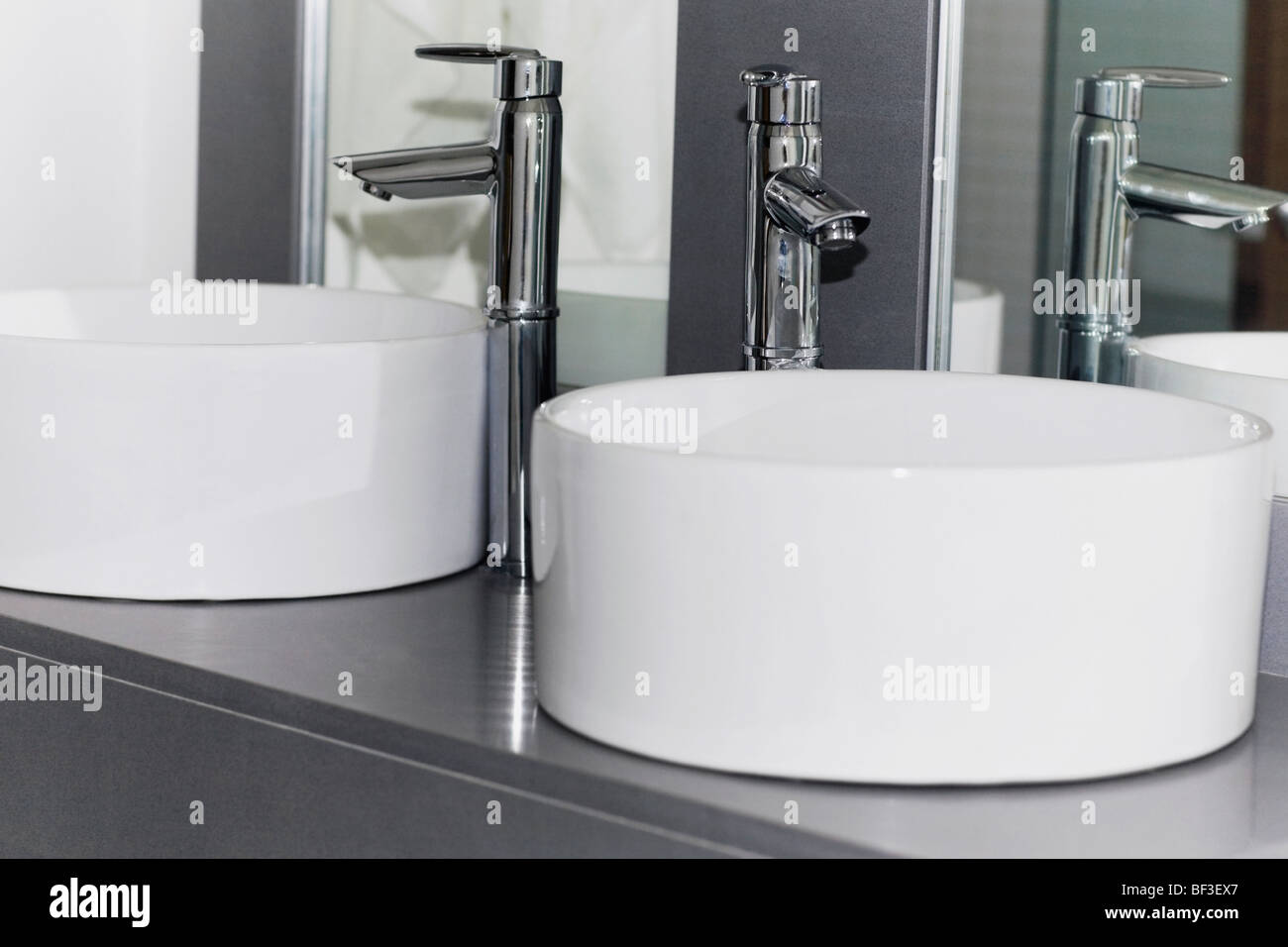 Wash bowls in the bathroom Stock Photo - Alamy