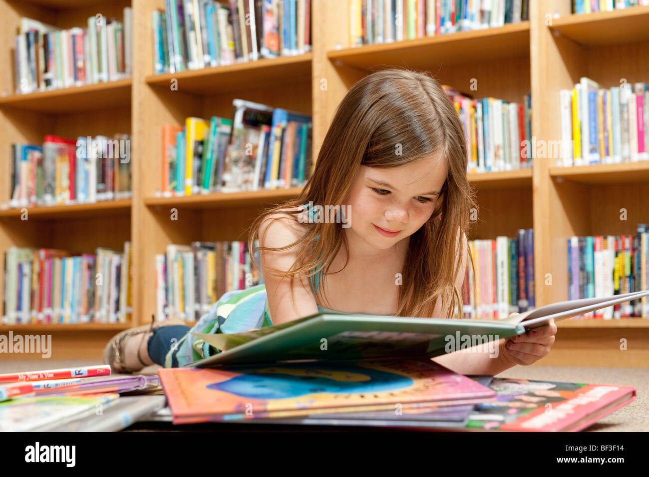 Student in School Library Stock Photo - Alamy