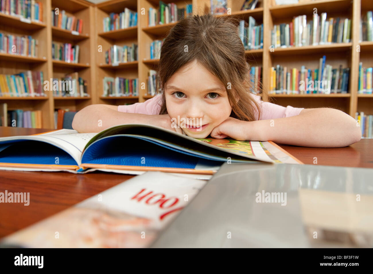 Student in School Library Stock Photo - Alamy