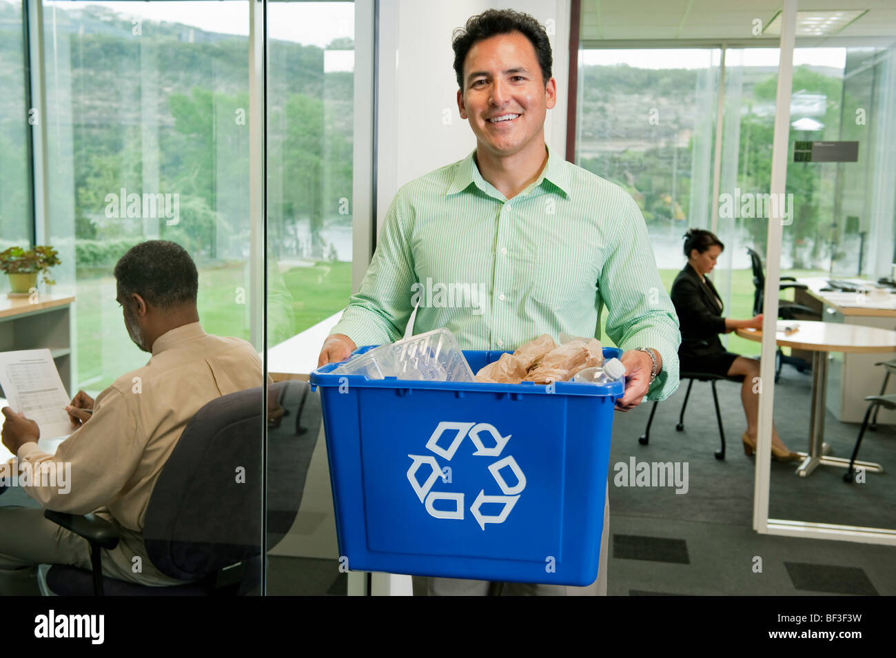 Recycling at the office Stock Photo - Alamy