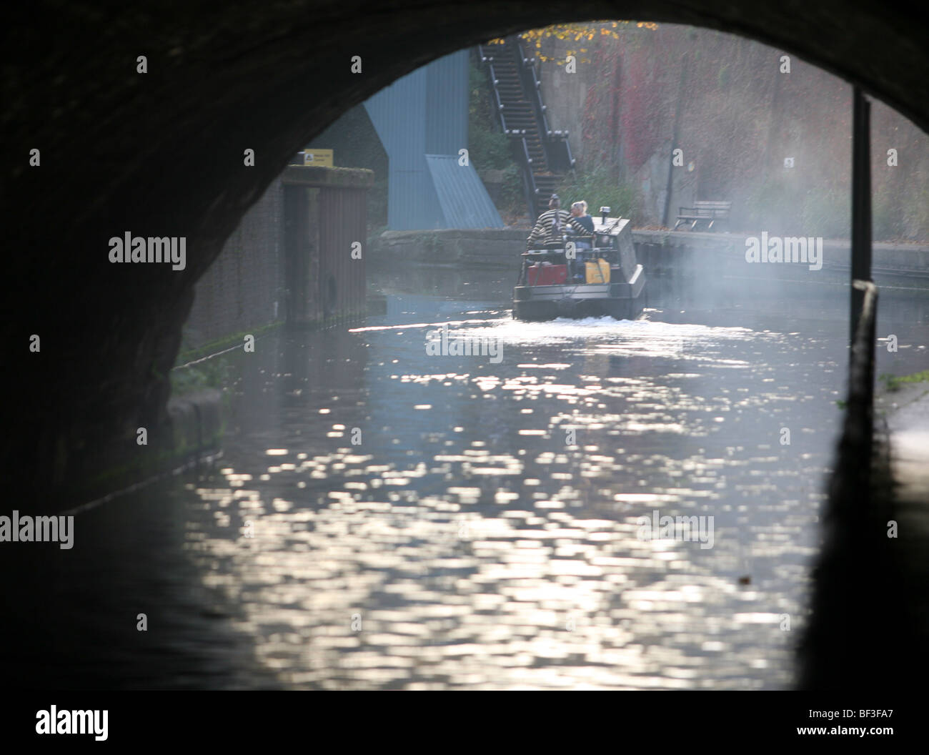 Barge traveling under a bridge Regents canal London Stock Photo - Alamy