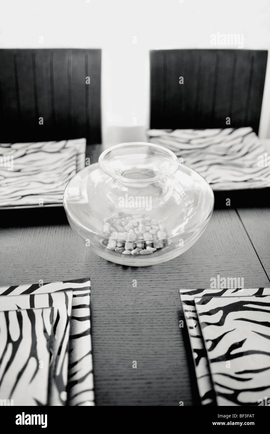 Trays and showpiece on a dining table Stock Photo - Alamy