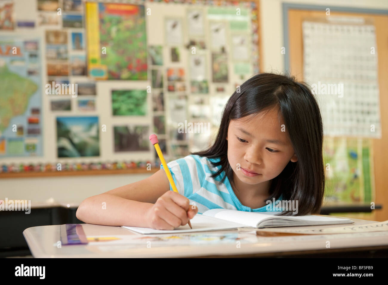 School girl 11 years working hi-res stock photography and images - Alamy