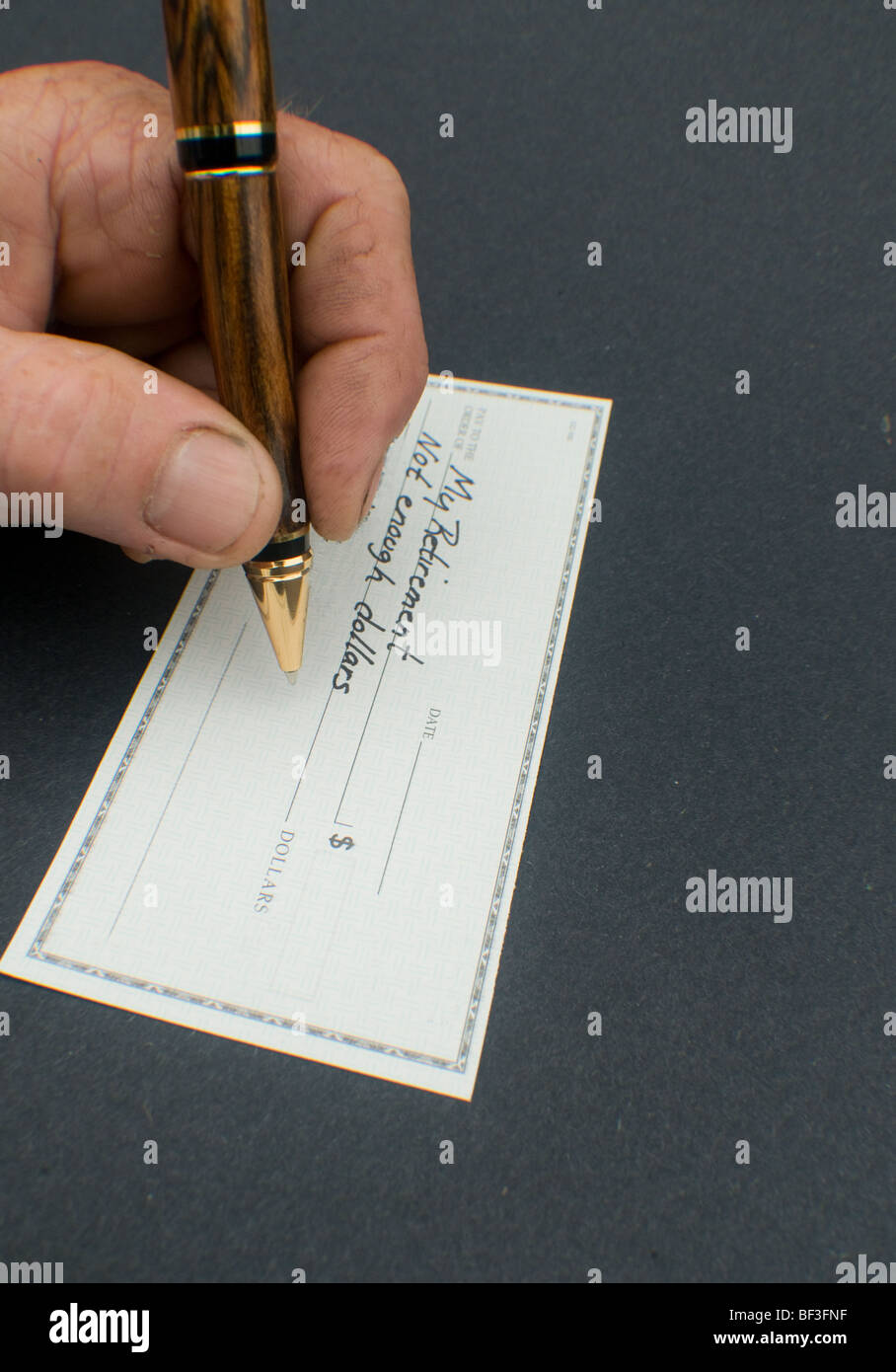 Male writing cheque hi-res stock photography and images - Alamy